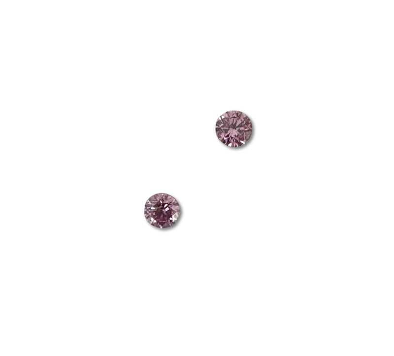 Lot 232 - Two Boxed Pink Coloured Diamonds.