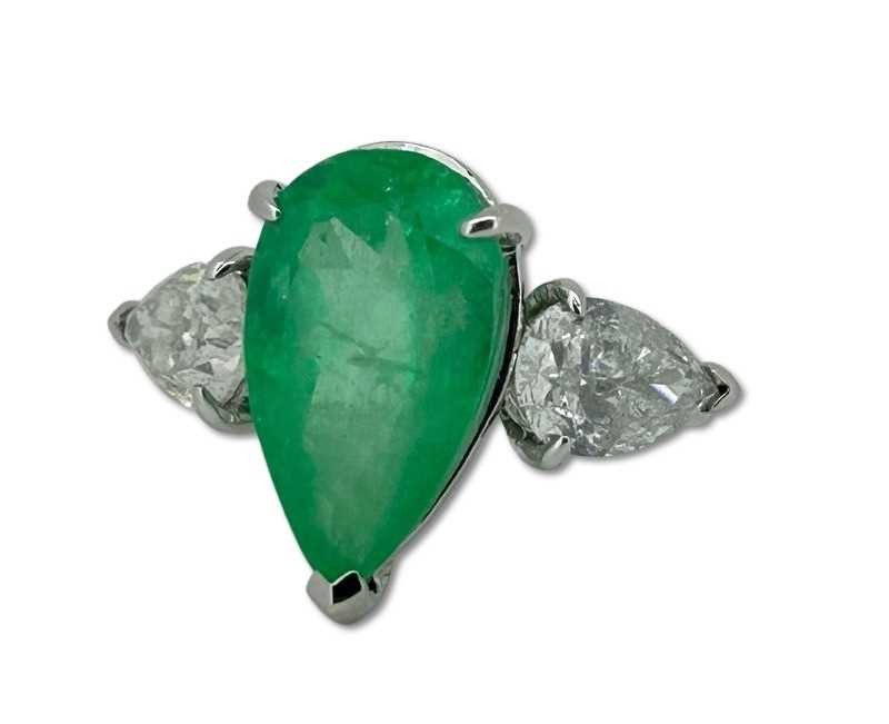 Lot 253 - Pear Shaped Emerald and Diamond Ring.