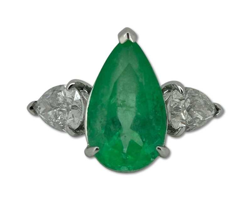 Lot 253 - Pear Shaped Emerald and Diamond Ring.